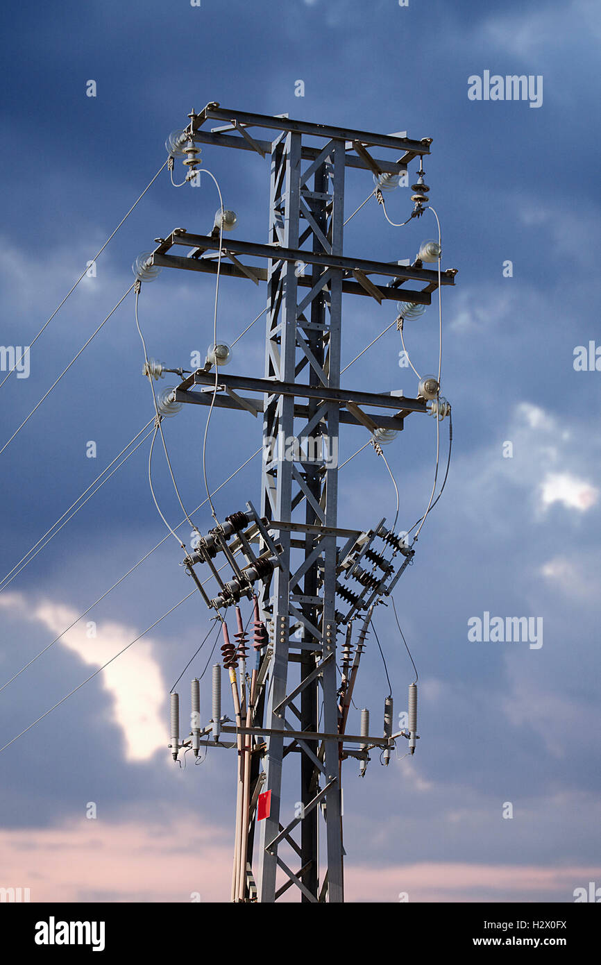 Electricity pylons with high-voltage wires Stock Photo - Alamy