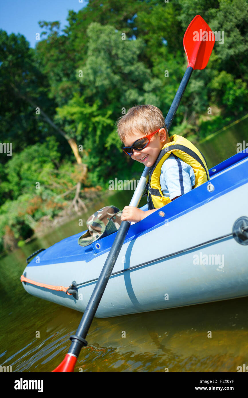 Boy male boating boat hi-res stock photography and images - Alamy