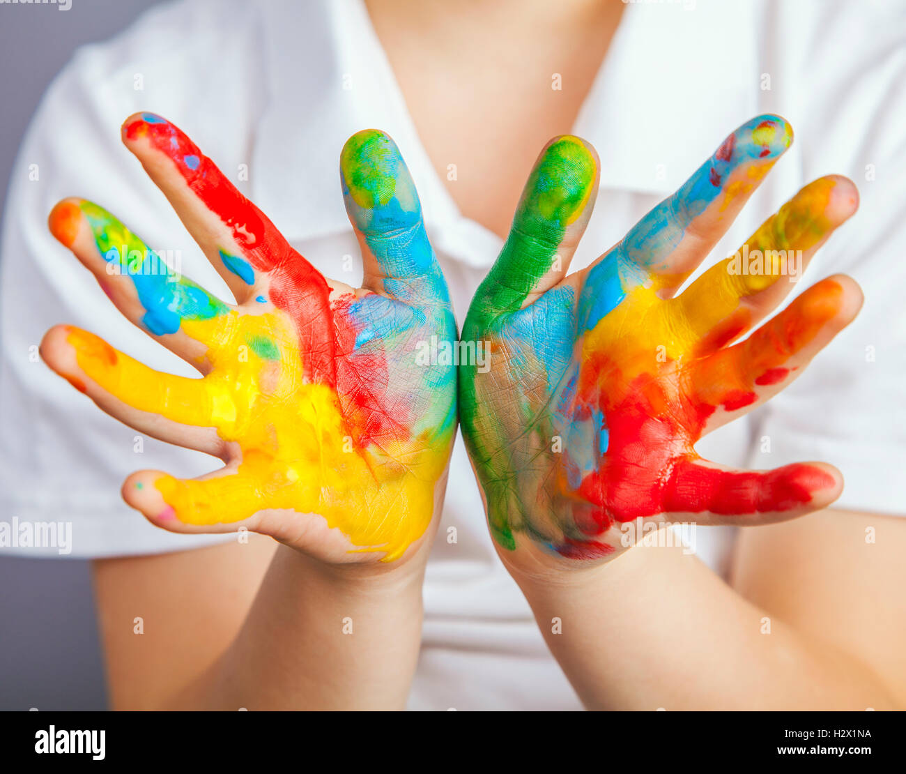 hands painted in colorful paints Stock Photo - Alamy