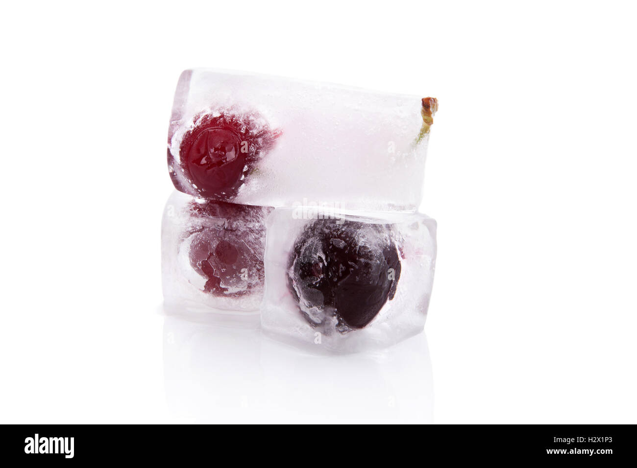 Frozen cherries isolated Stock Photo - Alamy