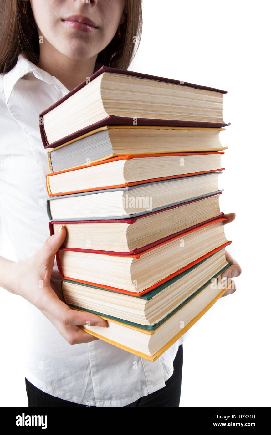 young girl holding a stack of books Stock Photo - Alamy