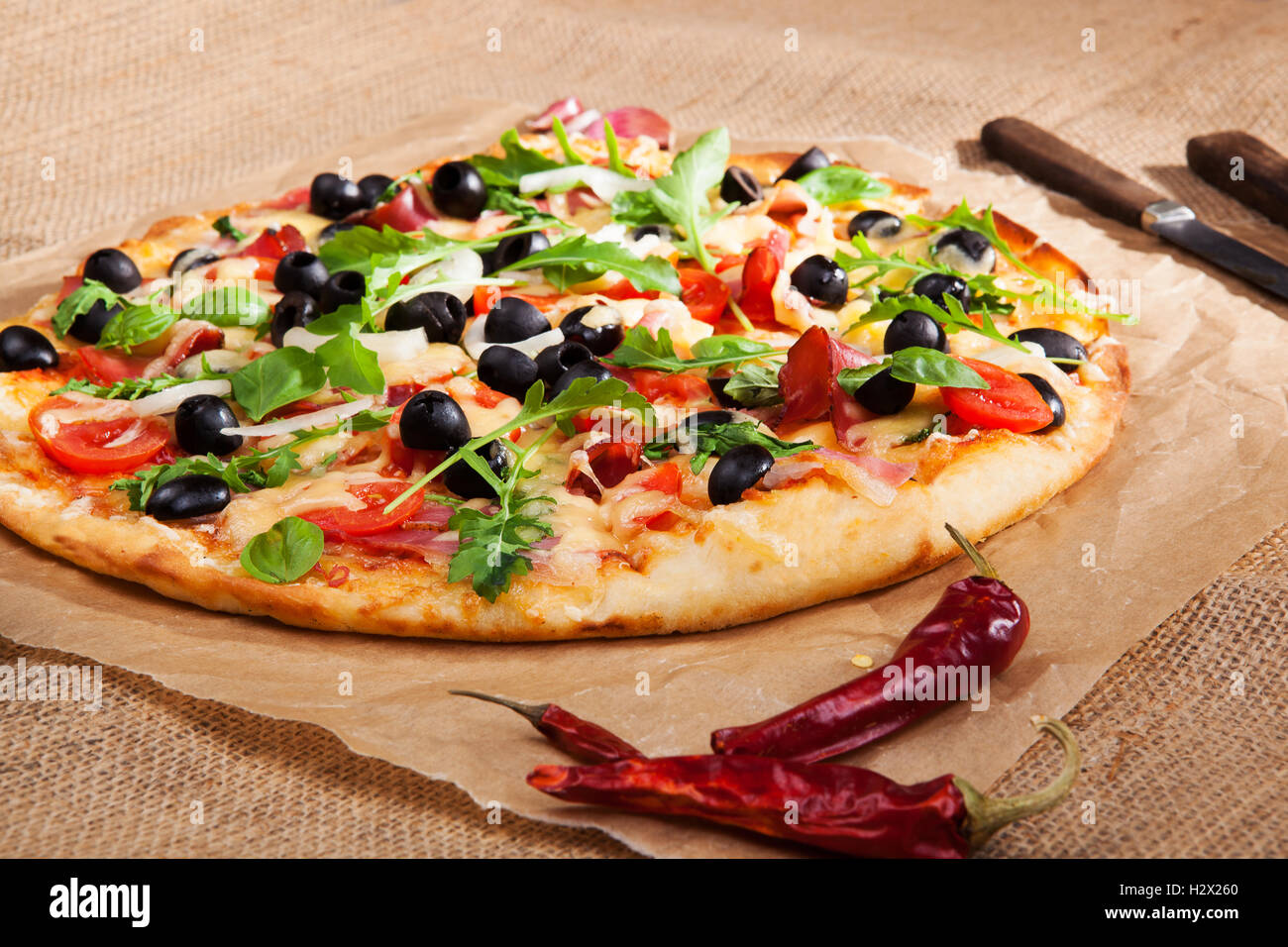 Fresh country style pizza Stock Photo - Alamy