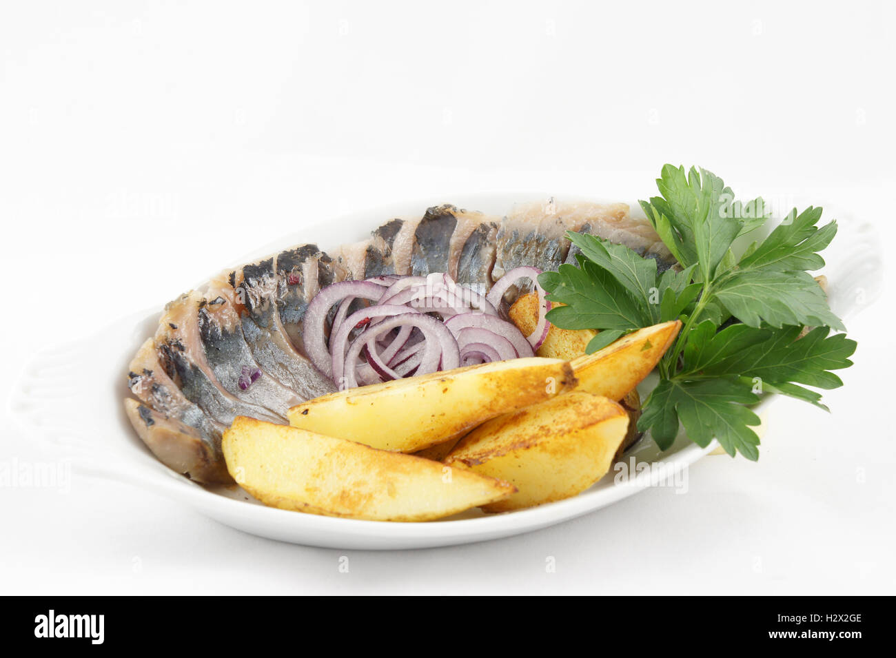 Herring with boiled potatoes hi-res stock photography and images - Alamy