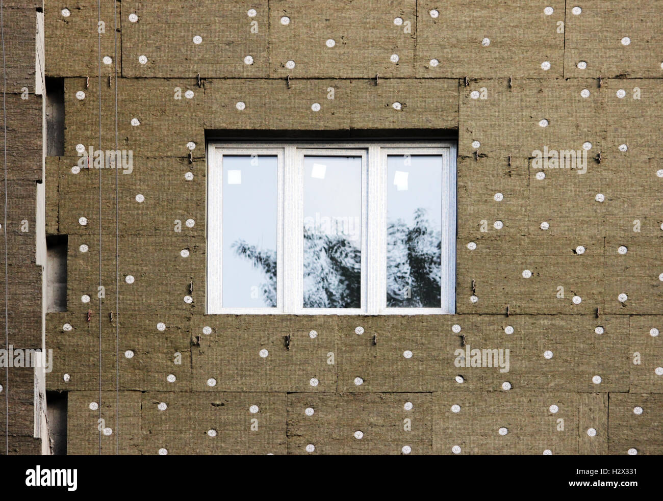 windows in a newly built house. wall structure with insulated non ...