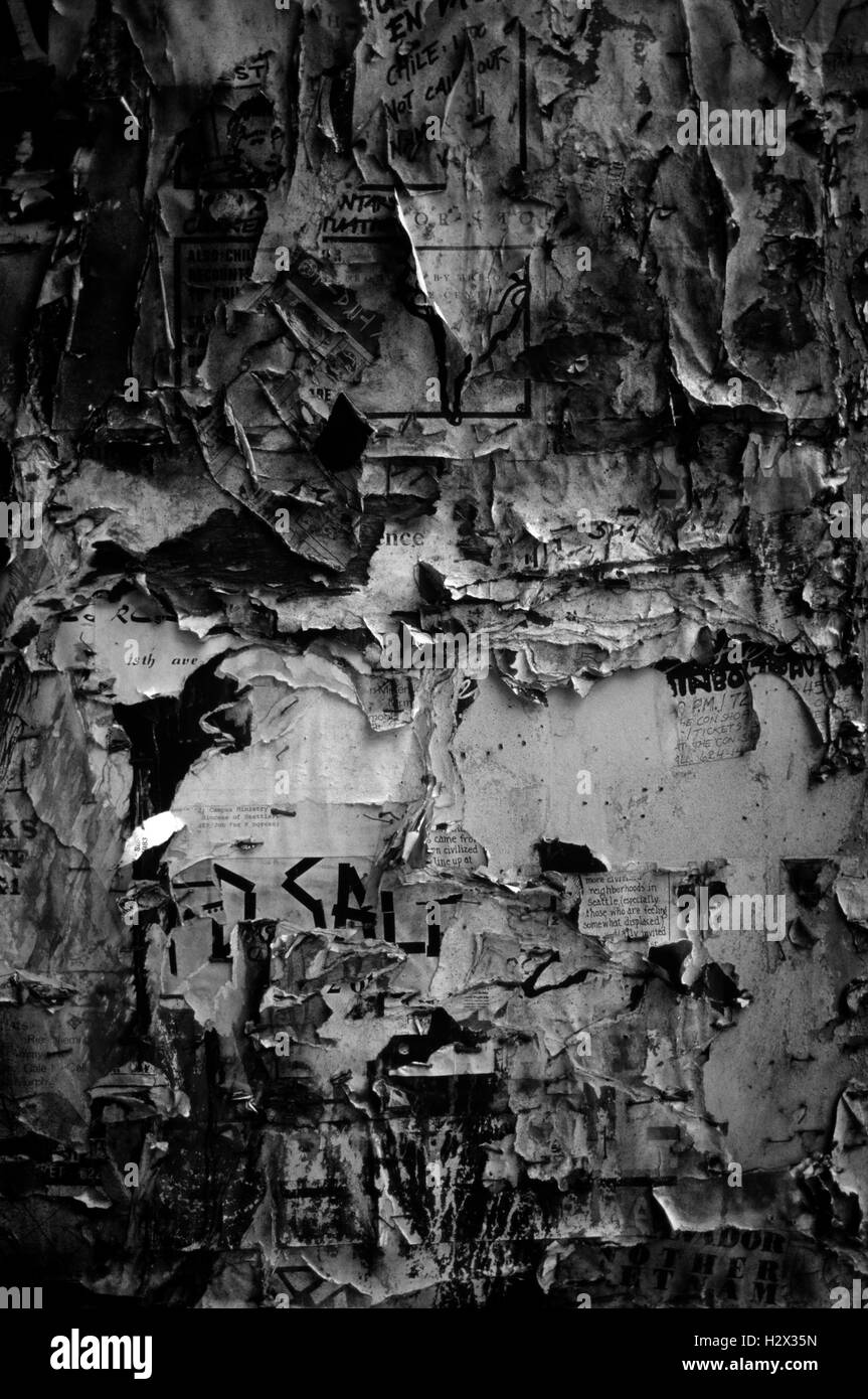 Posters on building Black and White Stock Photos & Images - Alamy