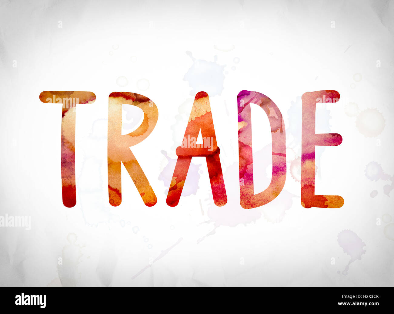 The word "Trade" written in watercolor washes over a white paper ...