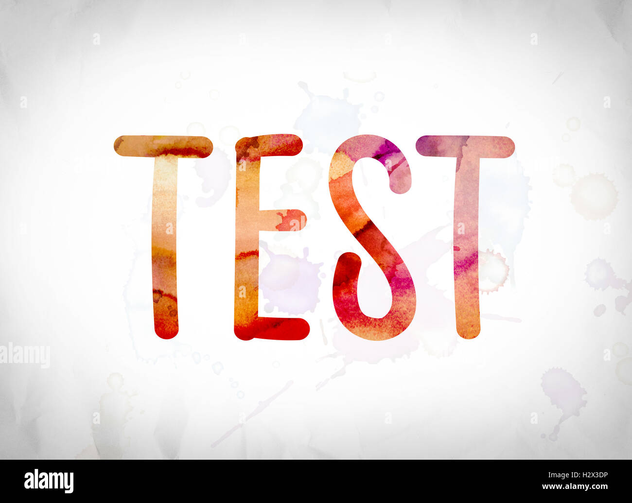 The word "Test" written in watercolor washes over a white paper ...