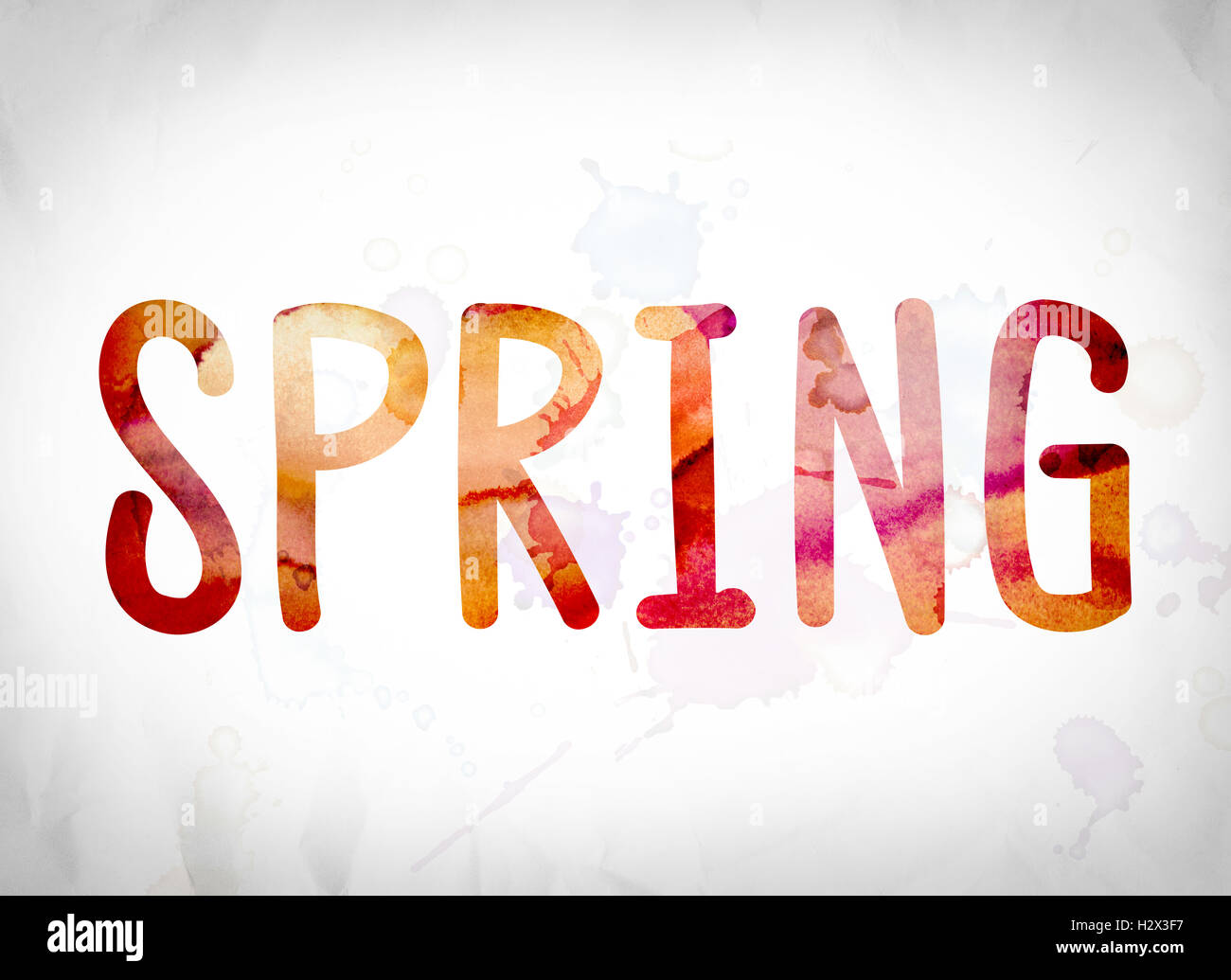The word "Spring" written in watercolor washes over a white paper ...