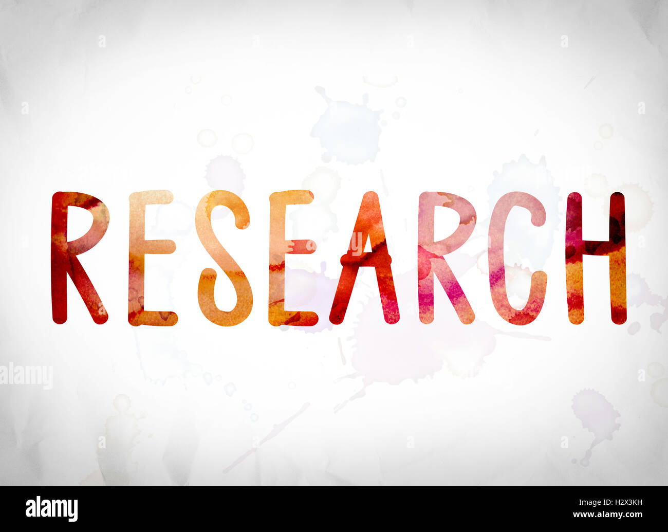 The word "Research" written in watercolor washes over a white paper ...