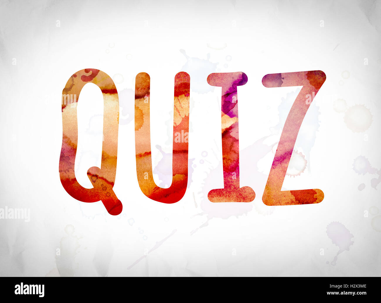 The word "Quiz" written in watercolor washes over a white paper ...