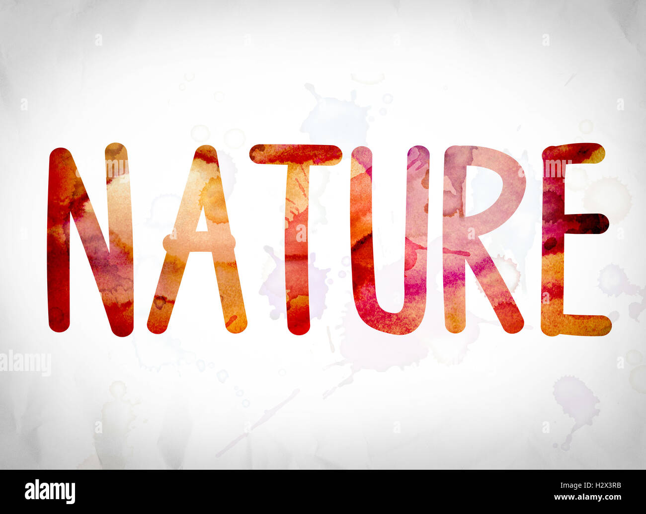 The word "Nature" written in watercolor washes over a white paper ...
