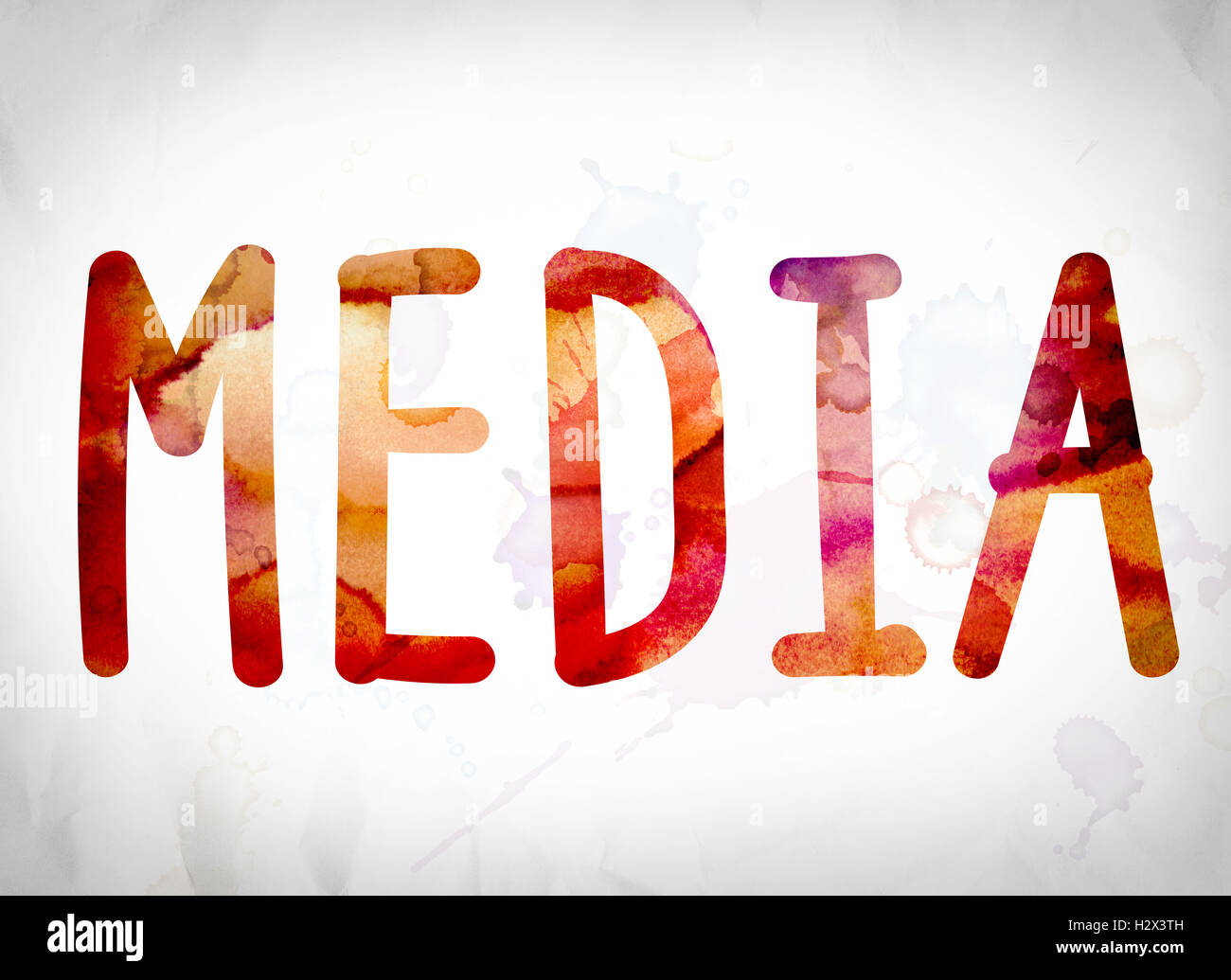 The word "Media" written in watercolor washes over a white paper ...