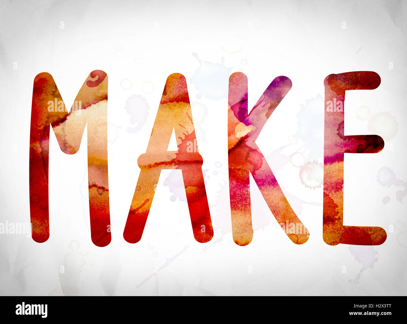 The word "Make" written in watercolor washes over a white paper ...