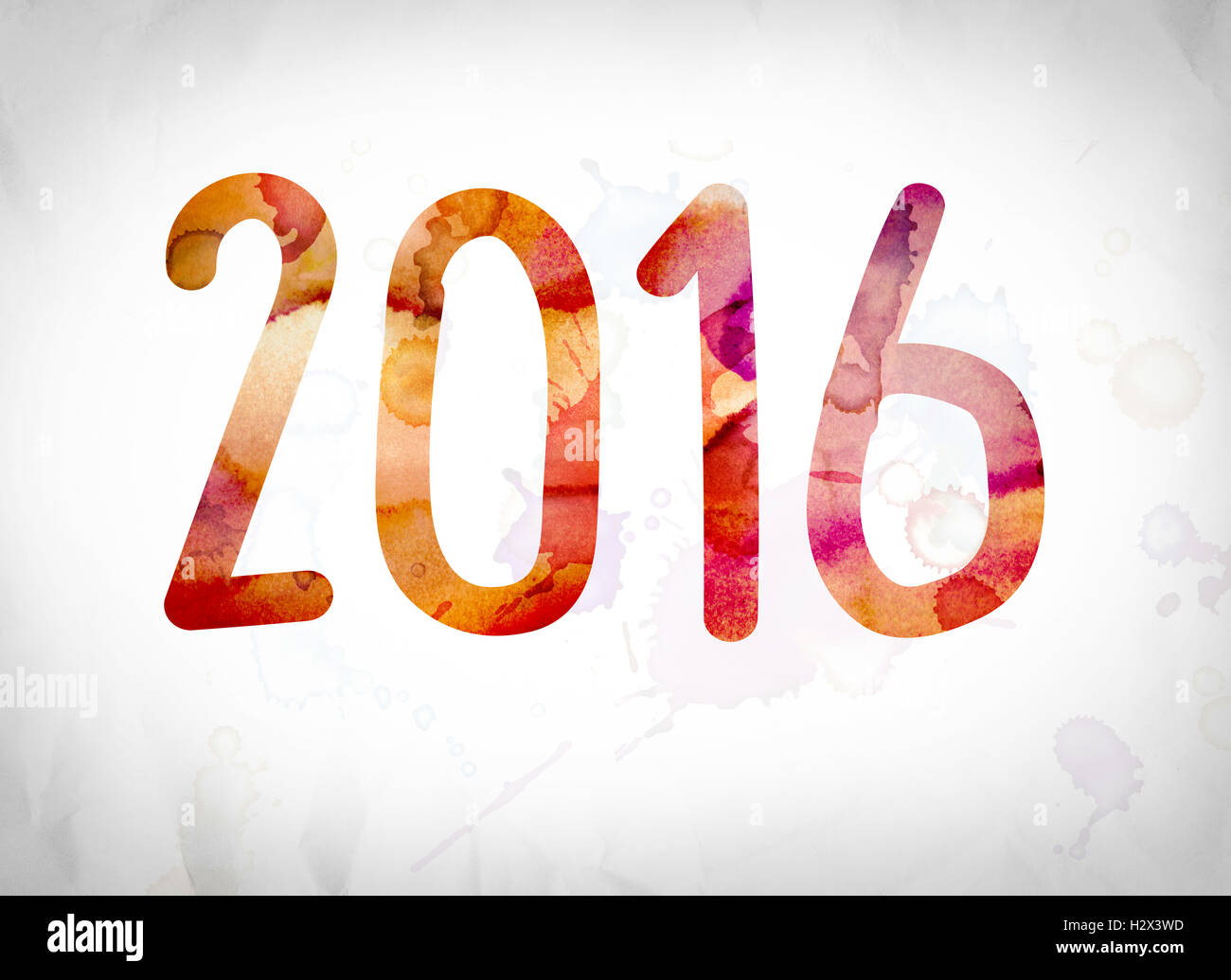 The word "2016" written in watercolor washes over a white paper ...