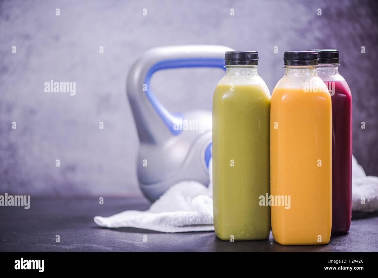 Set of natural energy drinks in gym, pre and after workout Stock Photo ...