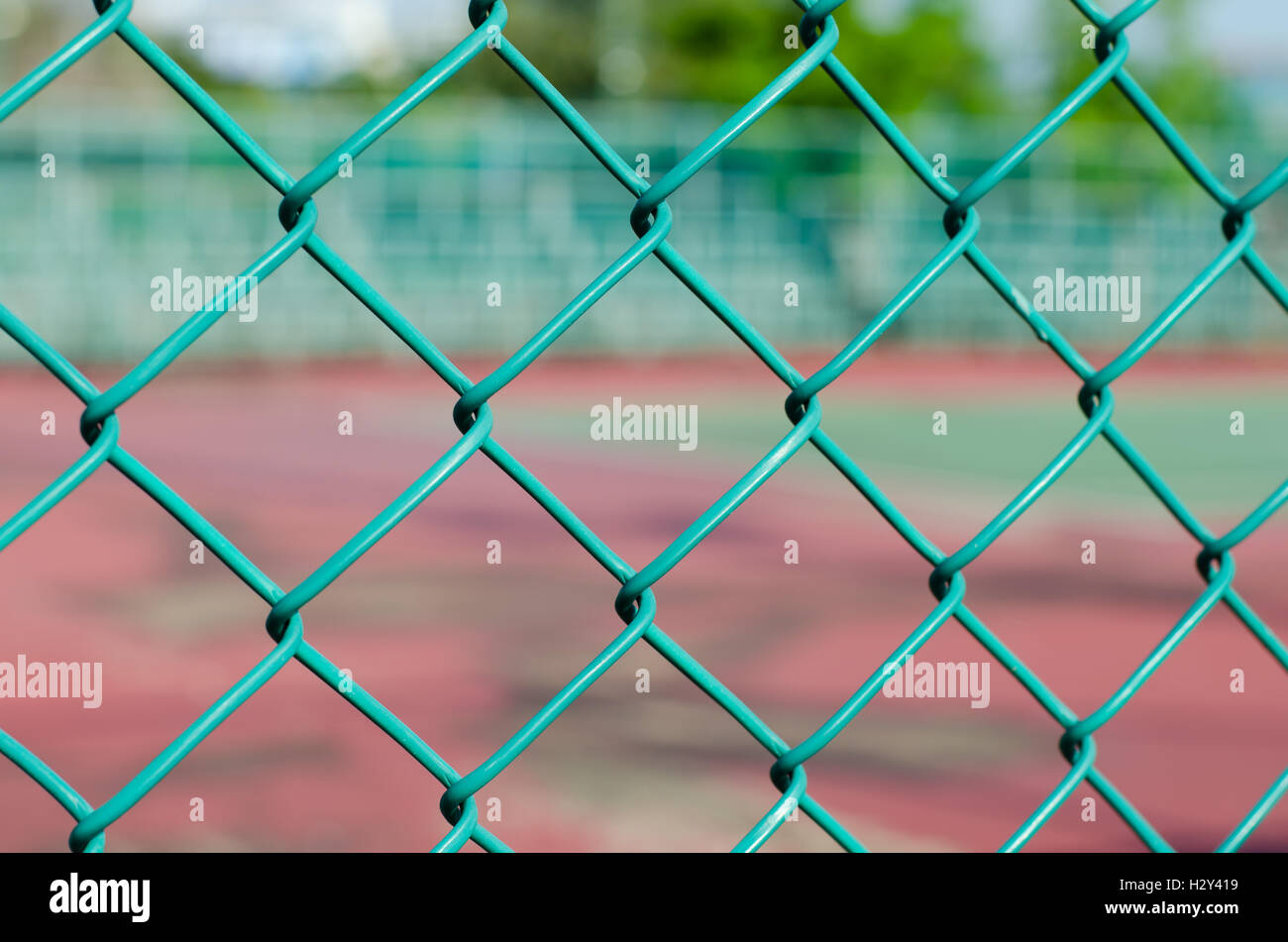 Wire Net Beside Outdoor Sports Court and Mini Stadium In Blurred ...