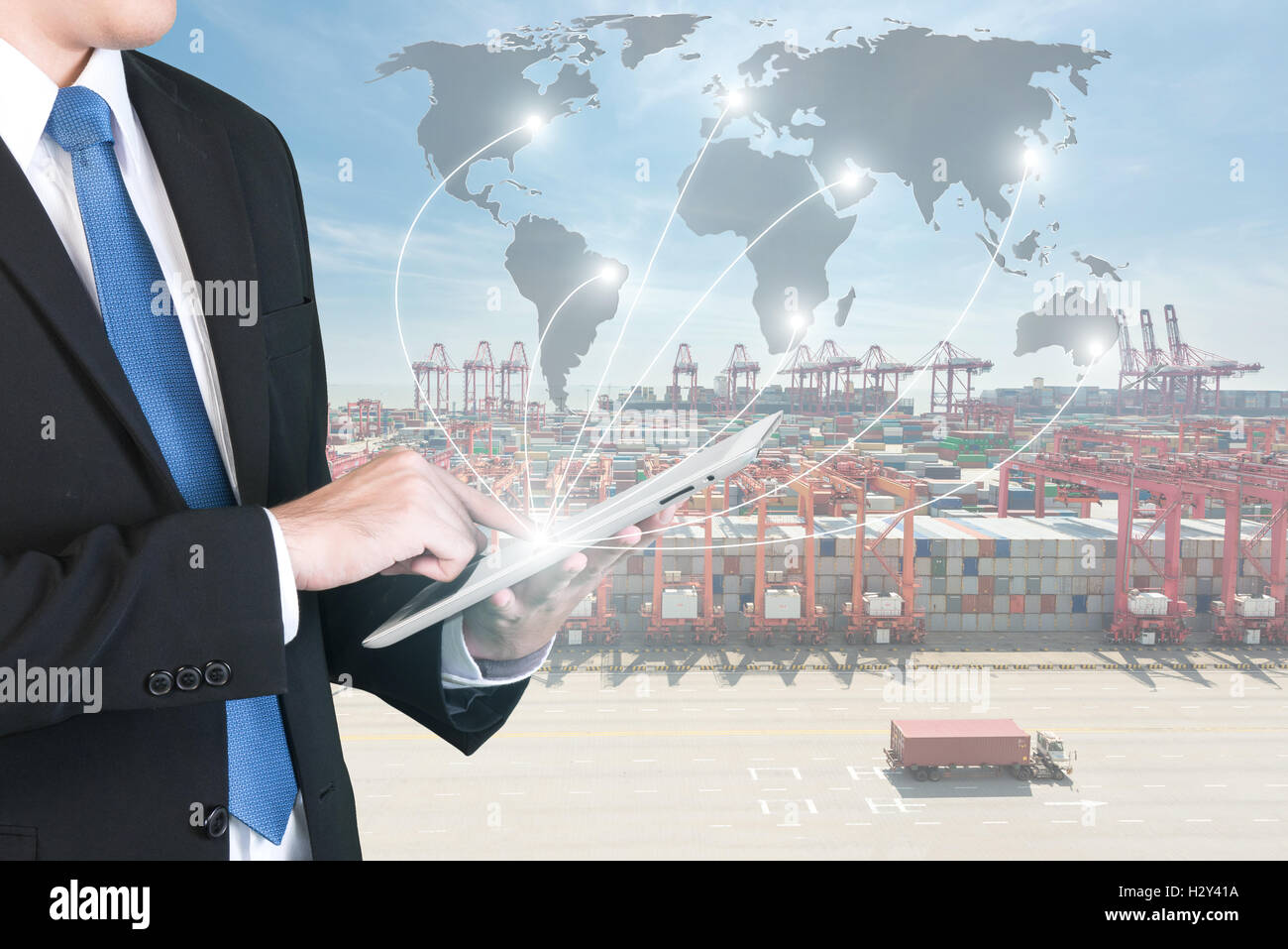 Import, Export, Logistics concept - Businessman press digital tablet to ...