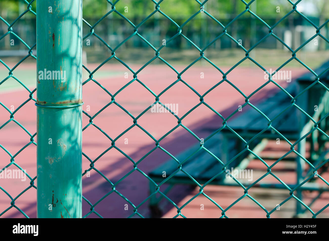 Wire Net Beside Outdoor Sports Court and Mini Stadium In Blurred ...