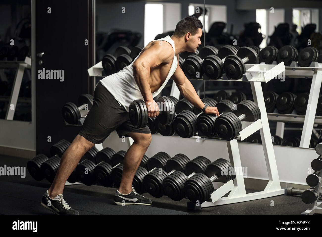Strong man holding hi-res stock photography and images - Alamy
