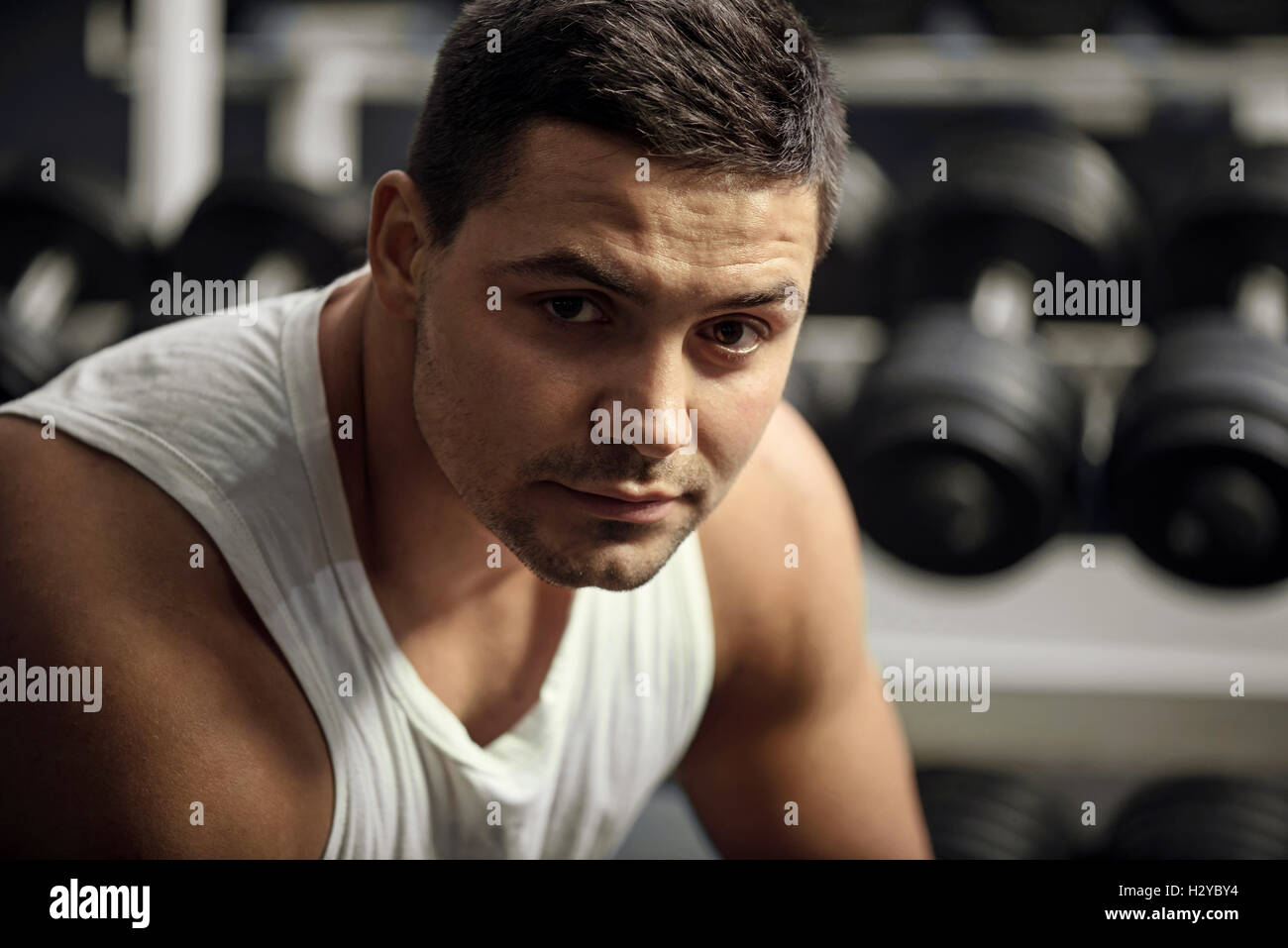 Young well built sportsman resting after a workout Stock Photo - Alamy