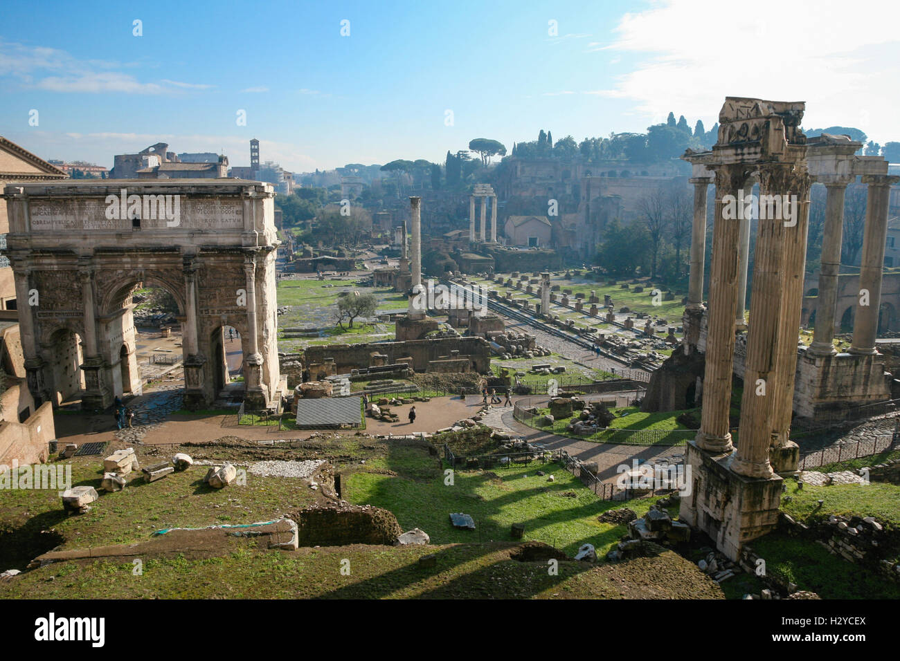 landscape of ancient Roman Forum ruins, with Septimius Severus Arch and ...
