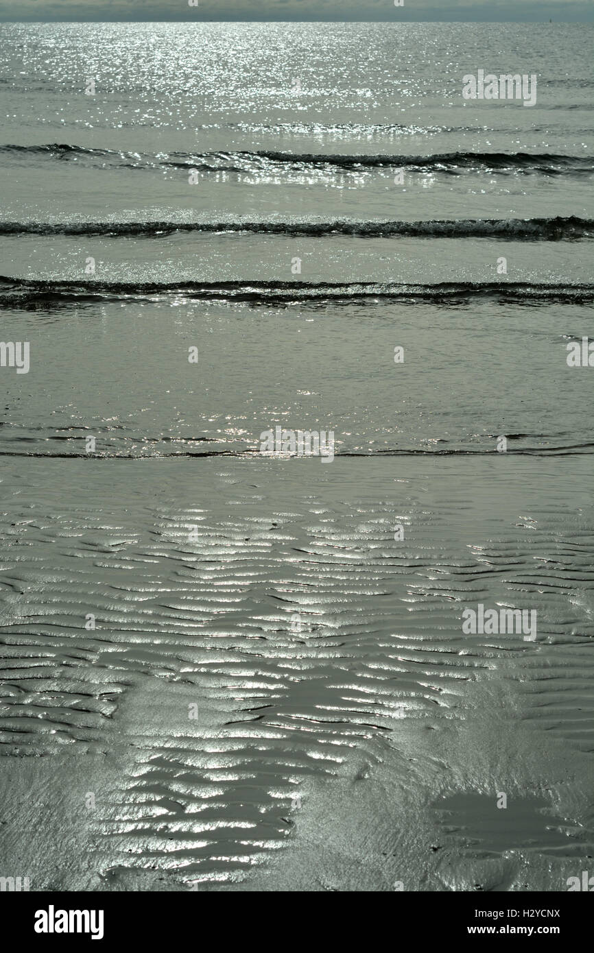 Ripples and patters on the beach Stock Photo - Alamy