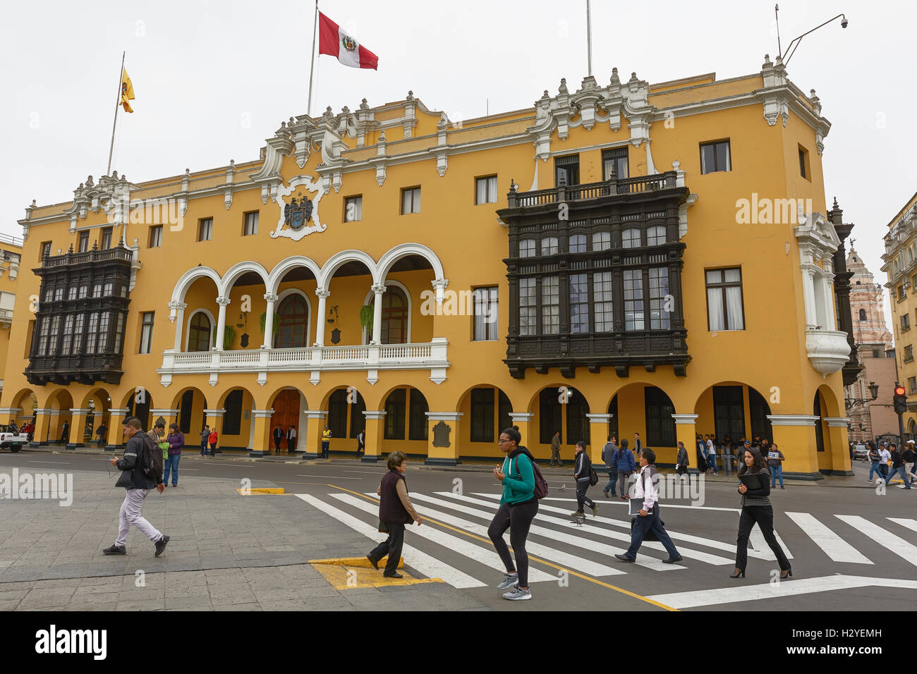 People and Tourists Crossing the Street at the Plaza Mayor in Lima ...