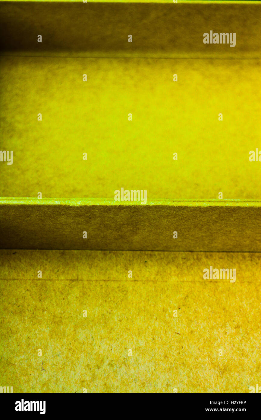 Inside of gold colored cardboard box Stock Photo - Alamy