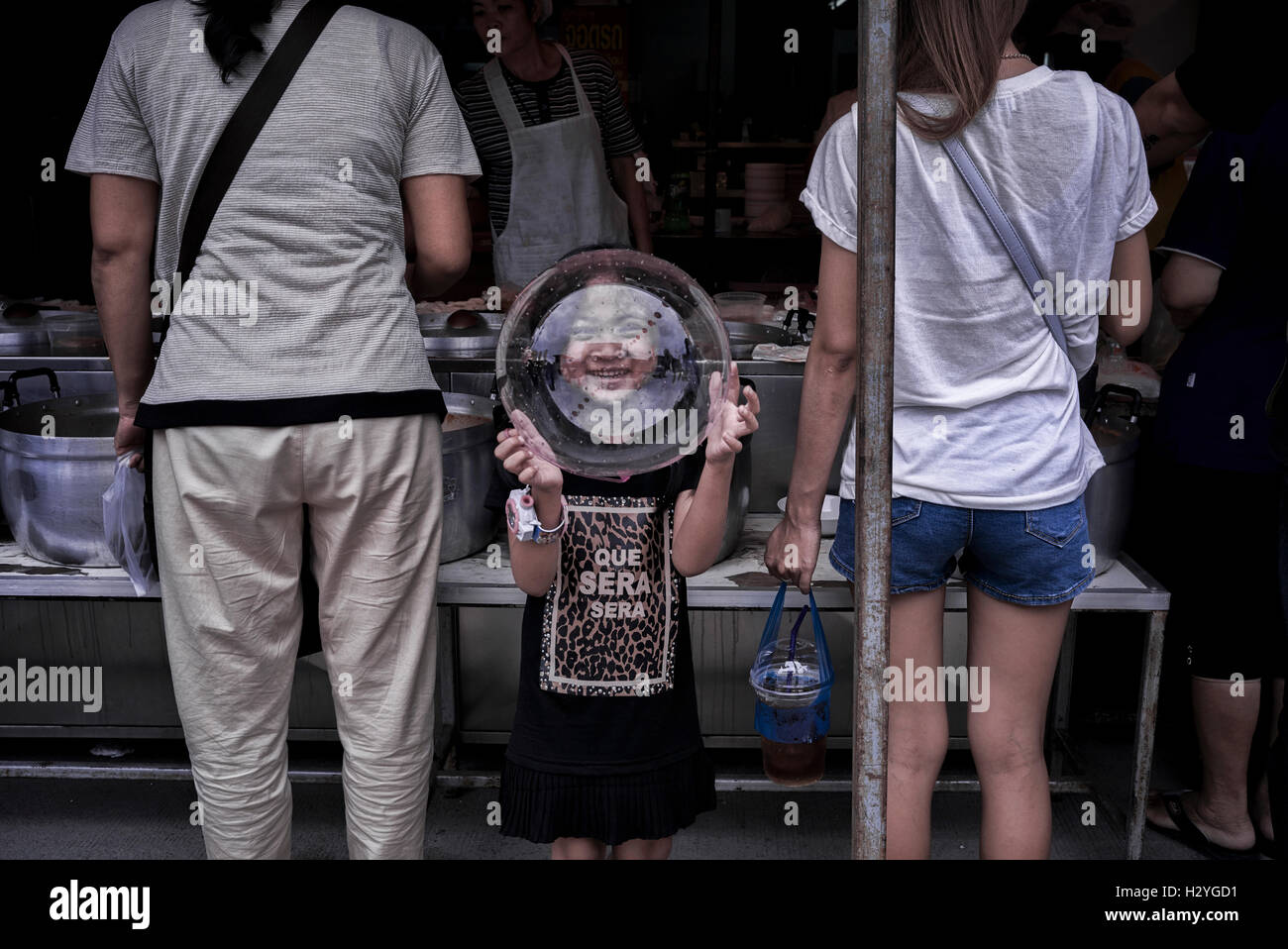 Child balloon. Looking through a transparent balloon. Funny children ...