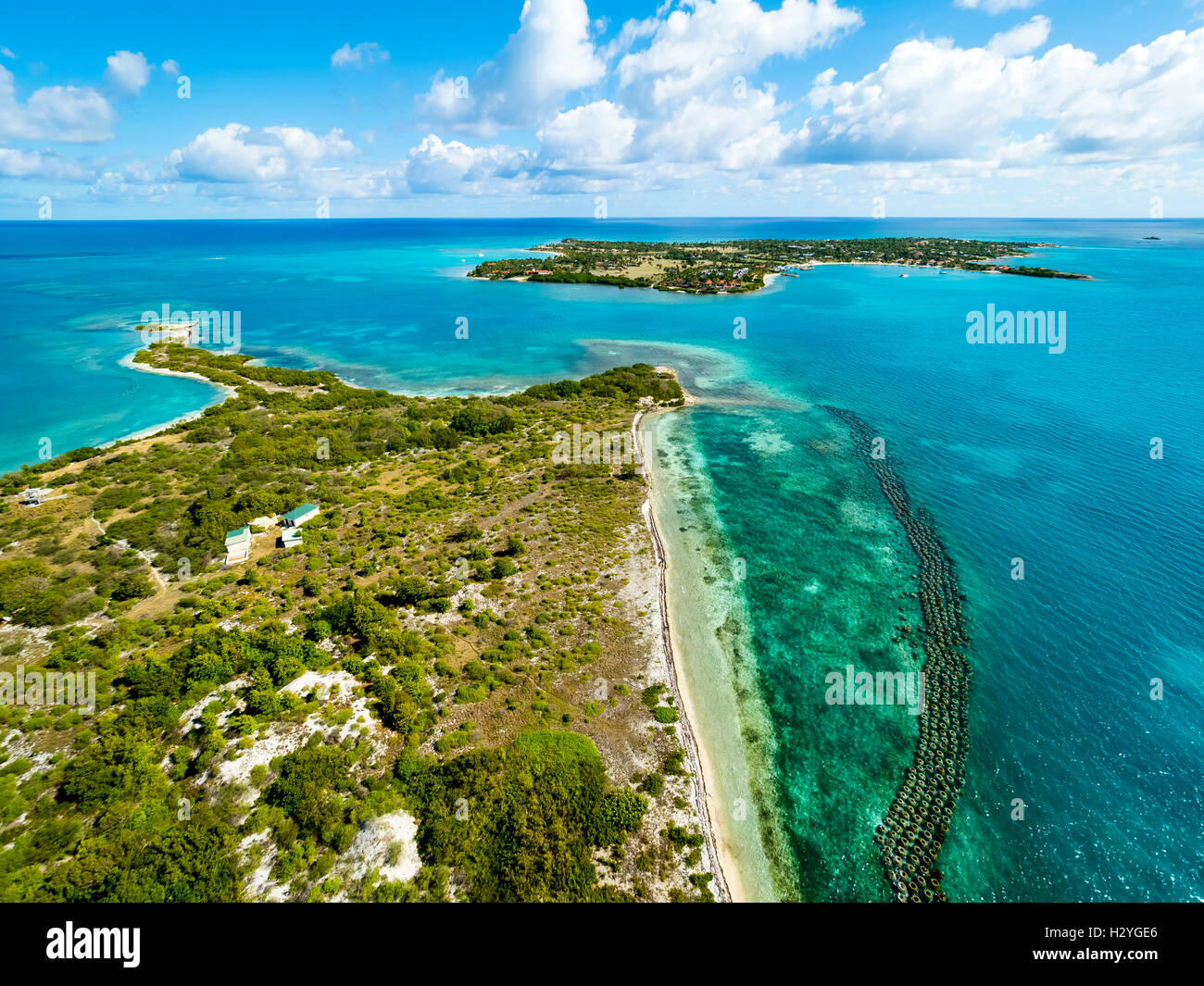 Maiden Island with fish traps, Long Island behind, West Indies ...