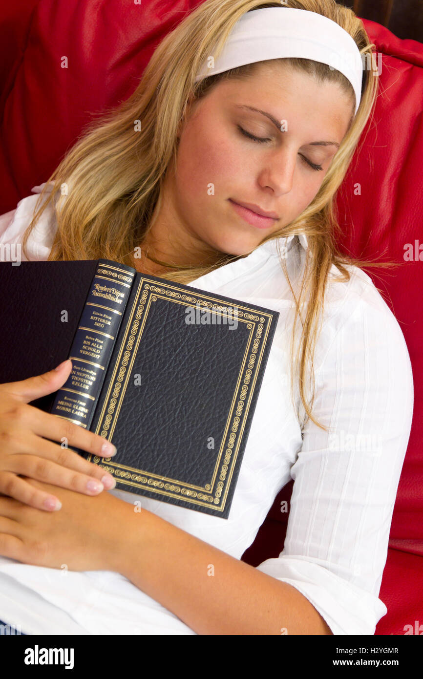 Asleep reading book head hi-res stock photography and images - Alamy