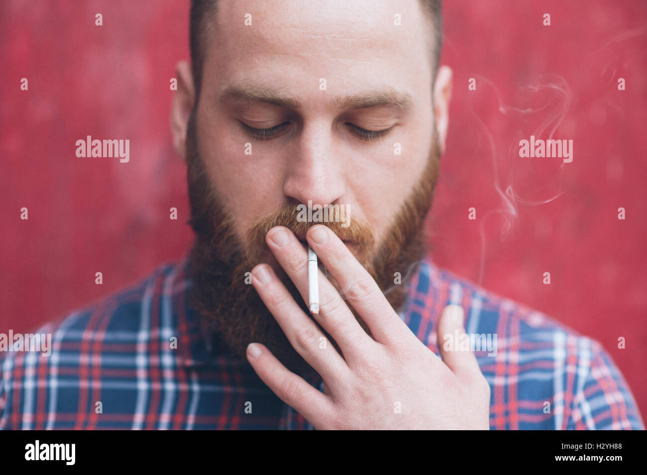 Cool guy smoking a cigarette hi-res stock photography and images - Alamy