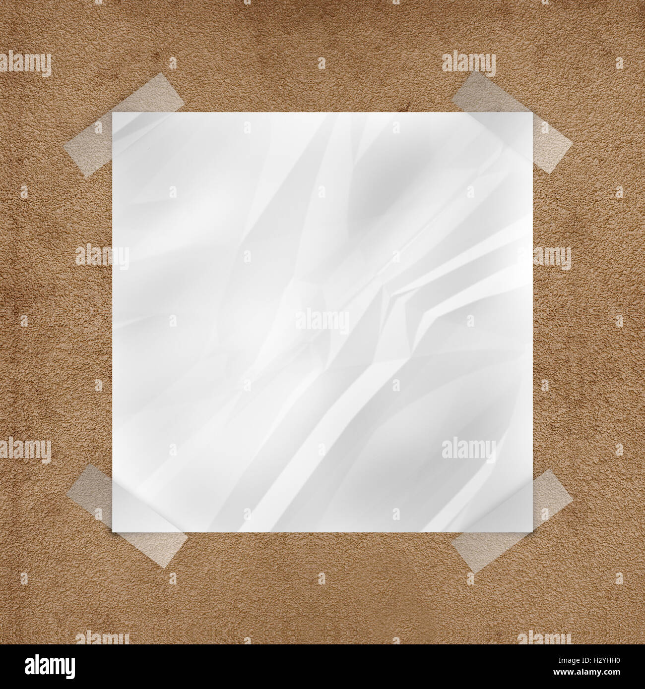 Wrinkled Note on Cork board Stock Photo - Alamy