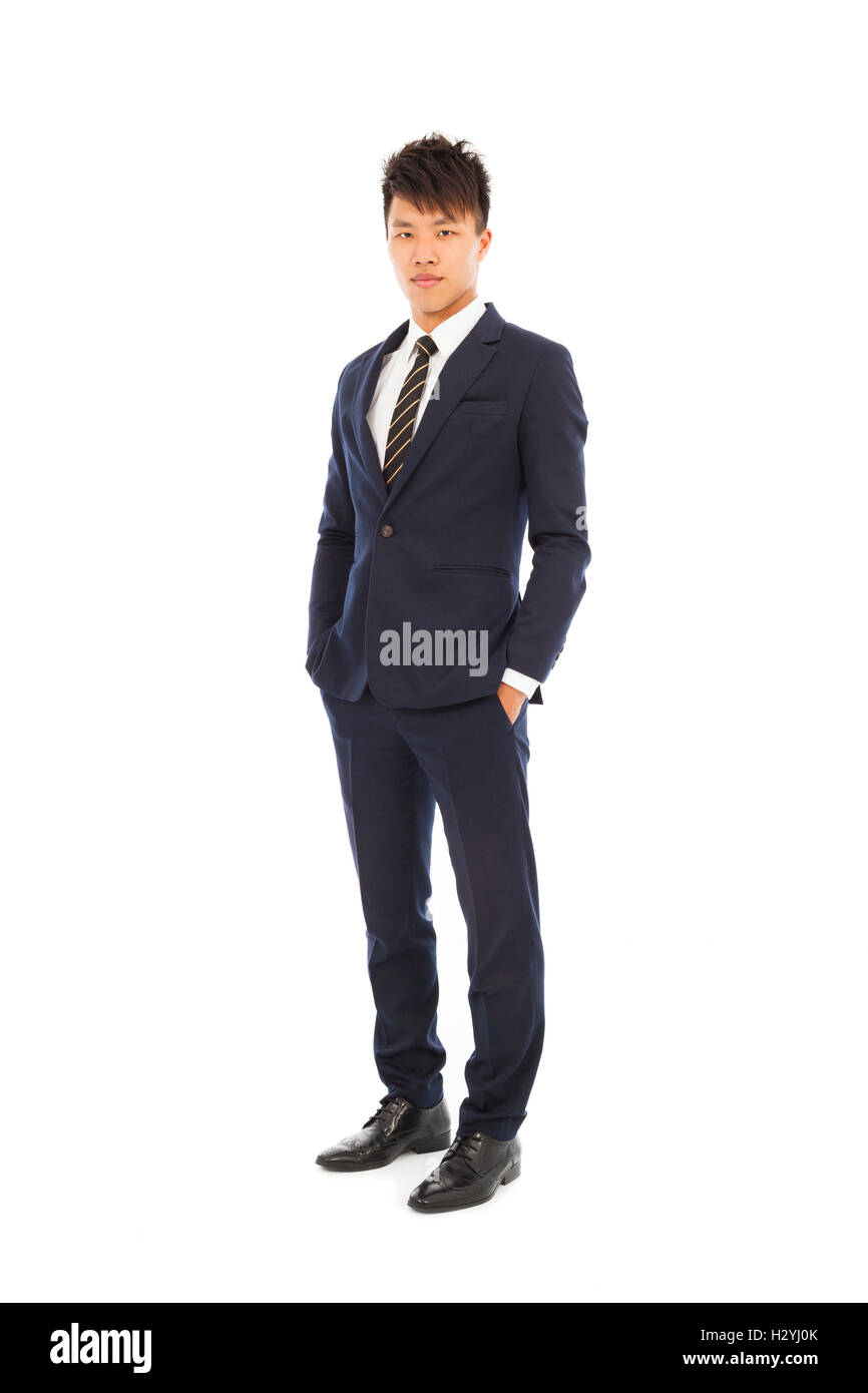 Full length of young businessman standing Stock Photo - Alamy