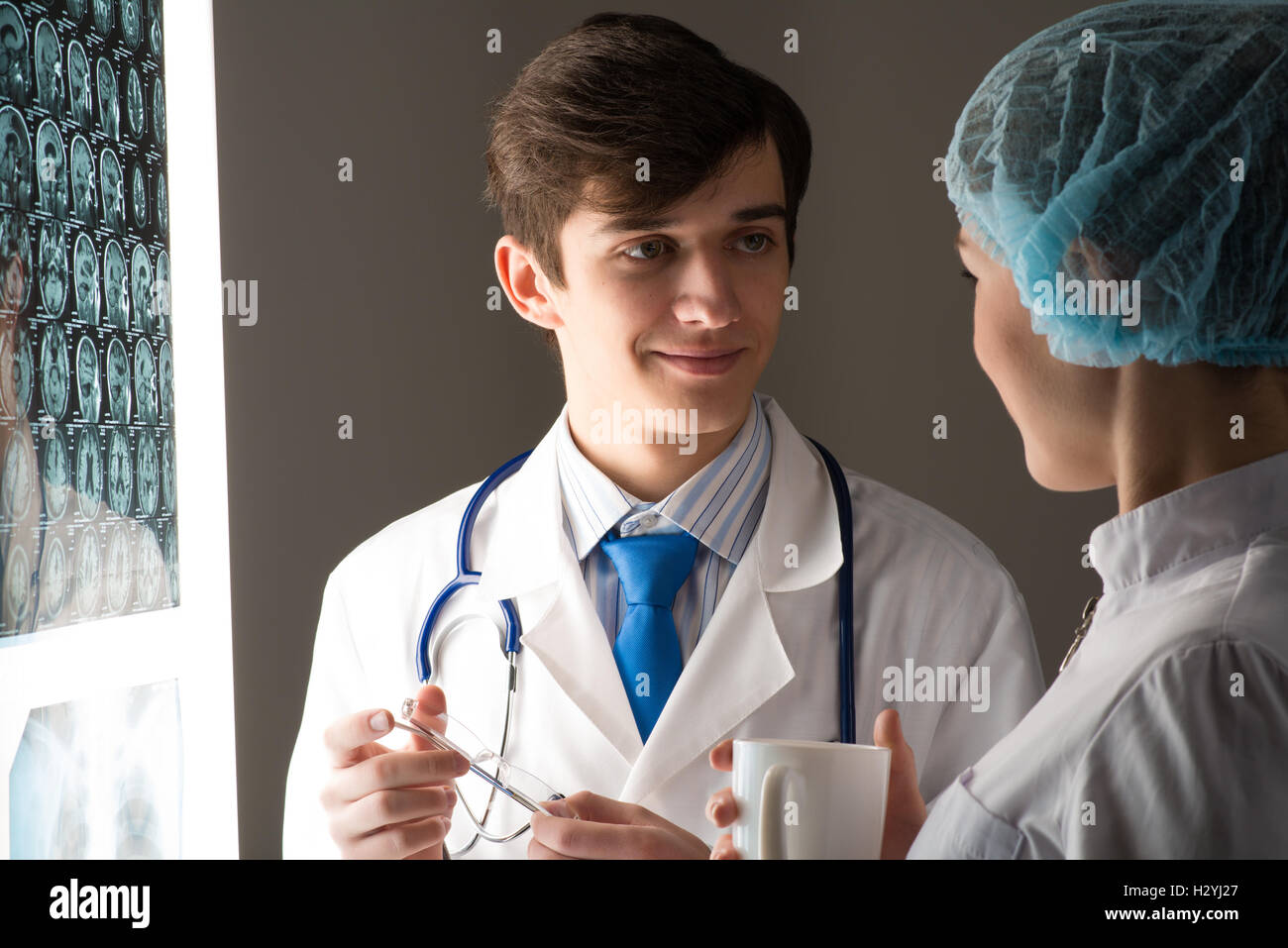 medical colleagues confer near the x-ray image Stock Photo - Alamy