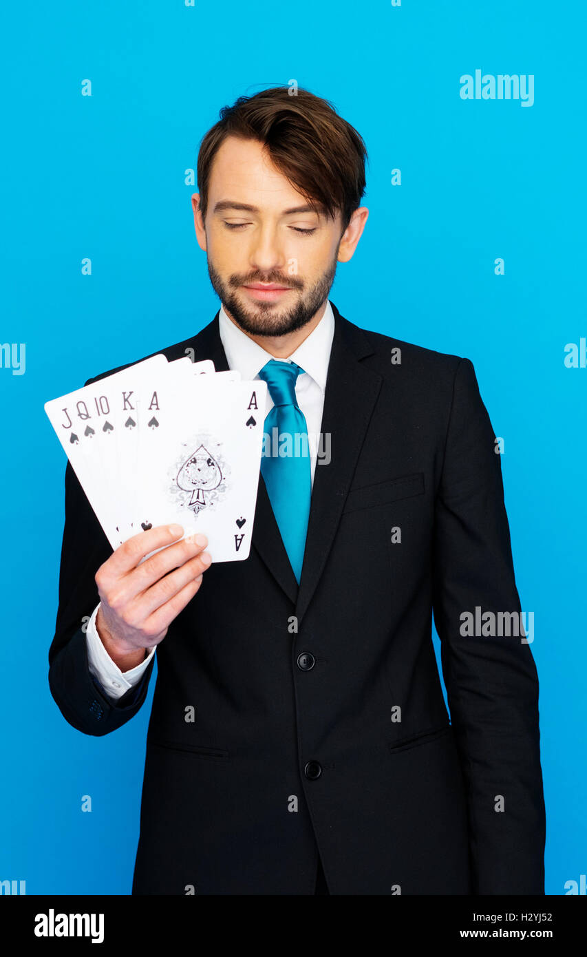 young business man showing playing cards Stock Photo - Alamy