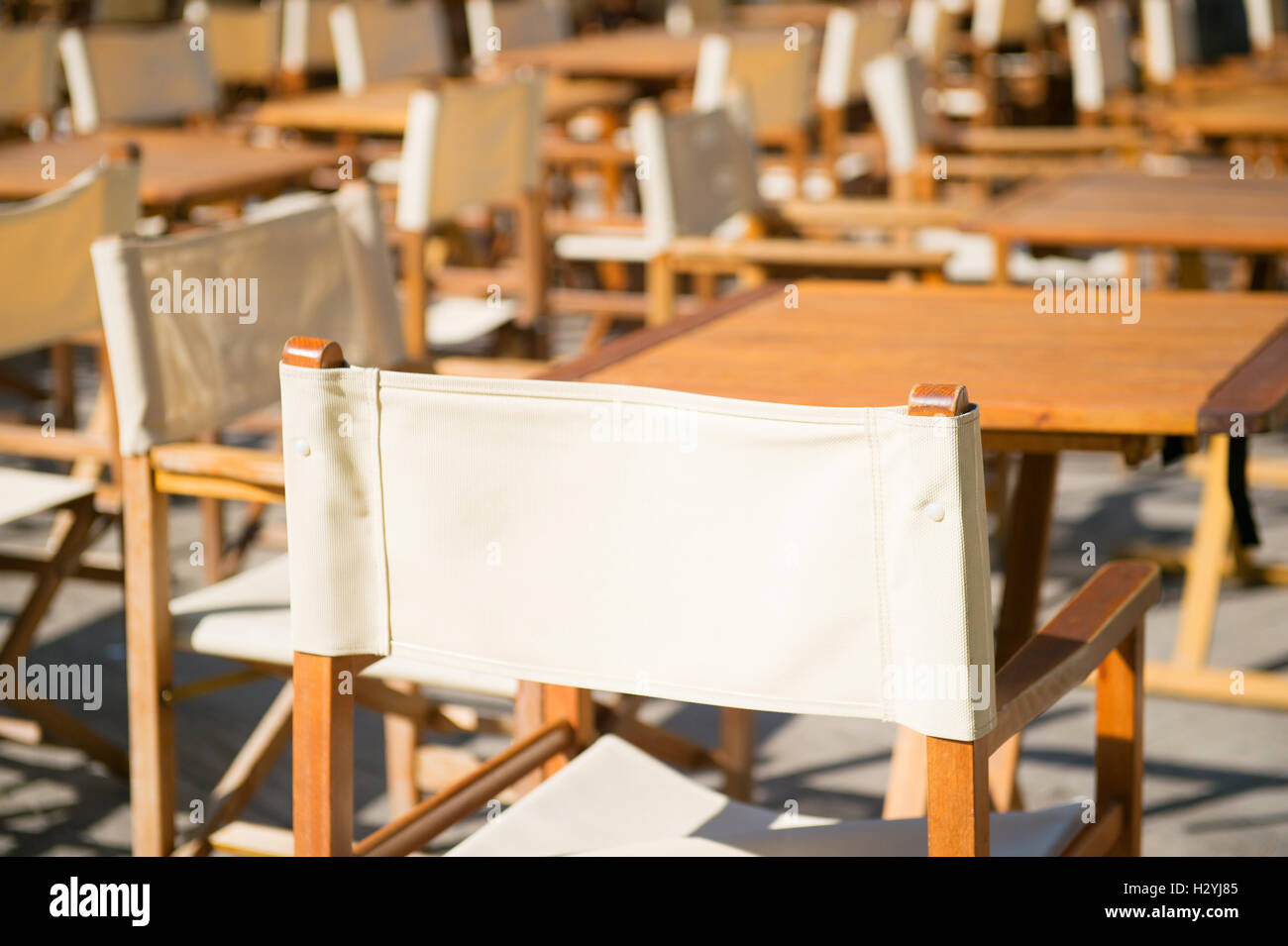 Terrace with tables and chairs Stock Photo - Alamy