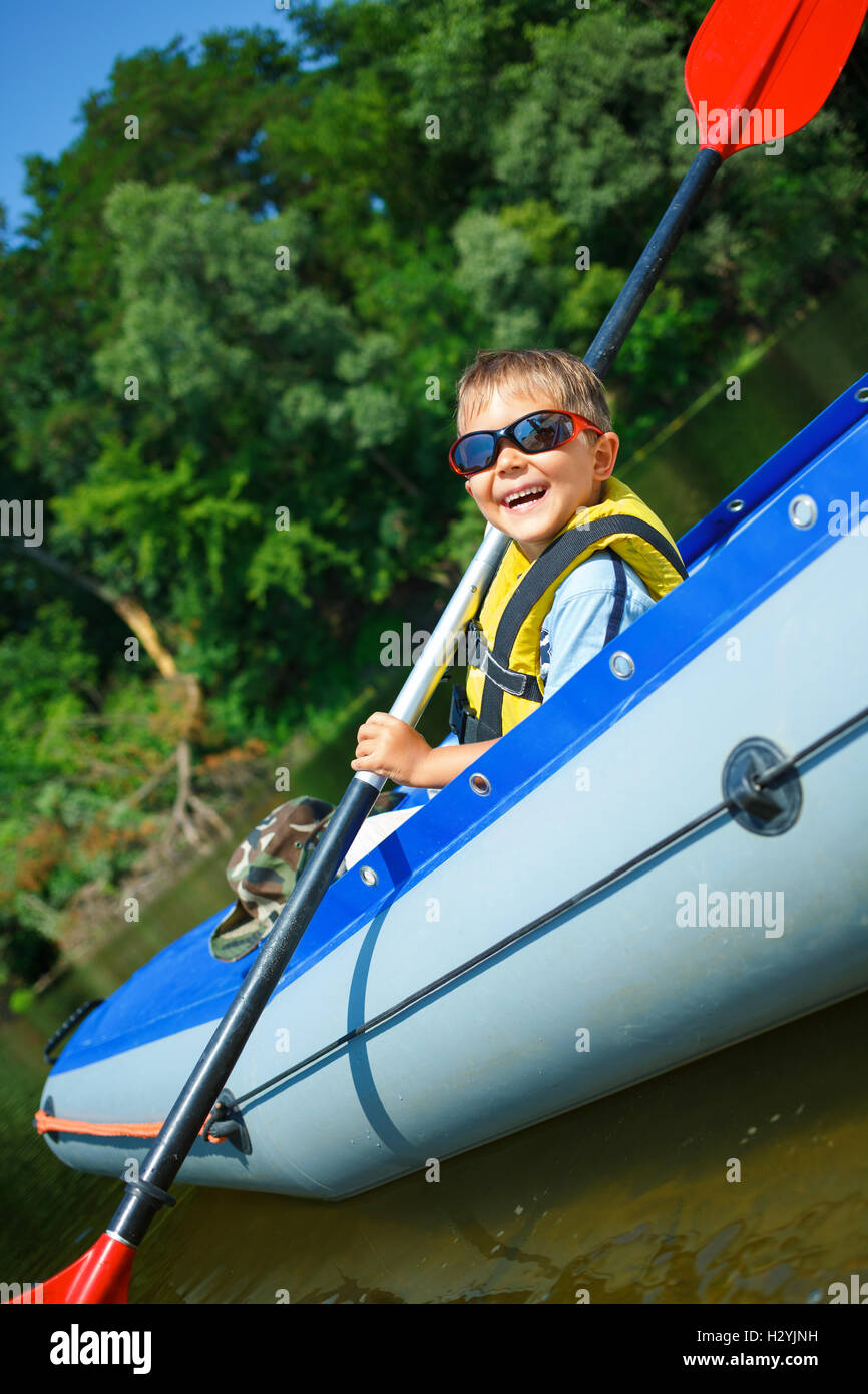 Boy male boating boat hi-res stock photography and images - Alamy