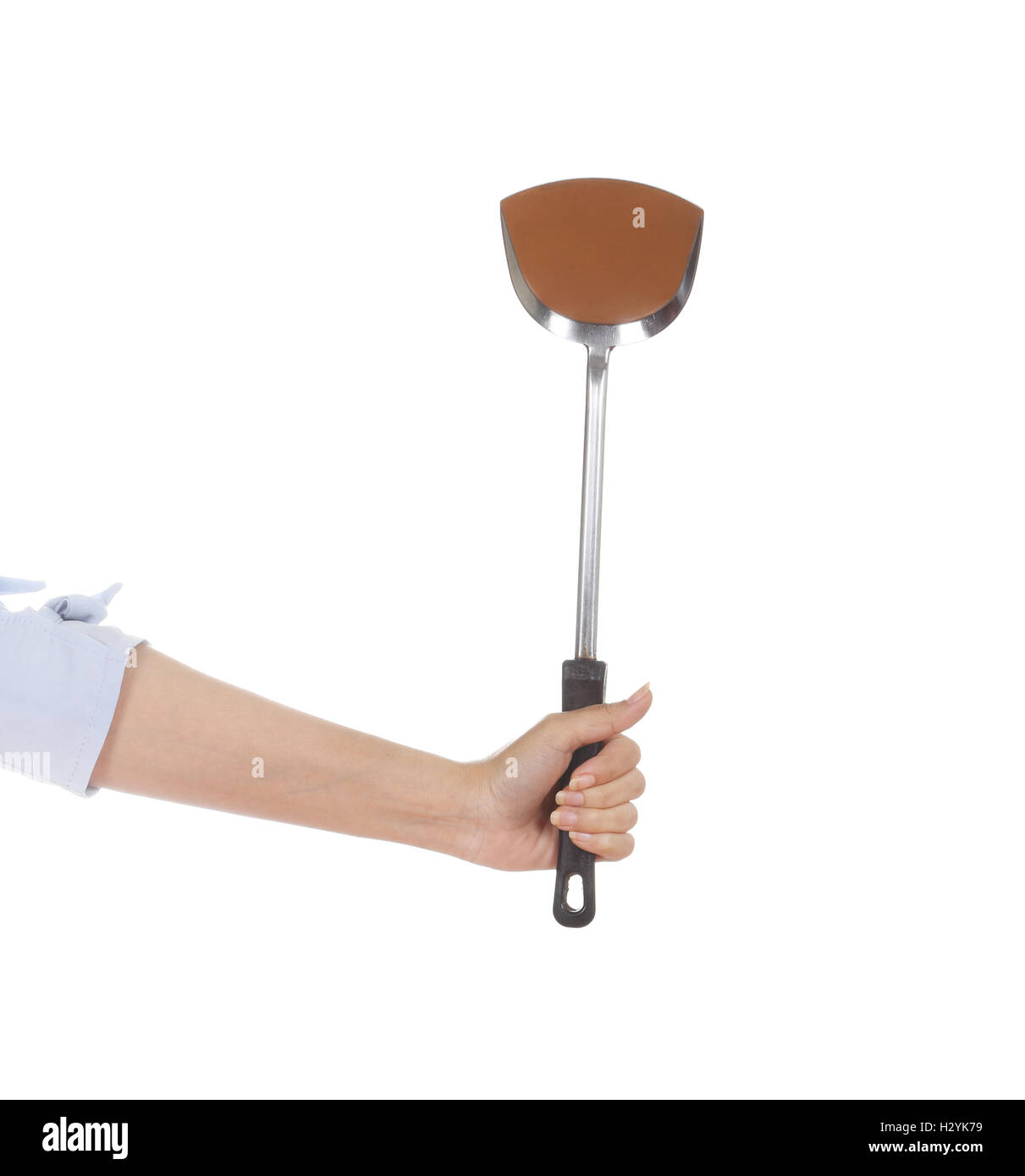 woman hand holding a kitchen spatula Stock Photo - Alamy