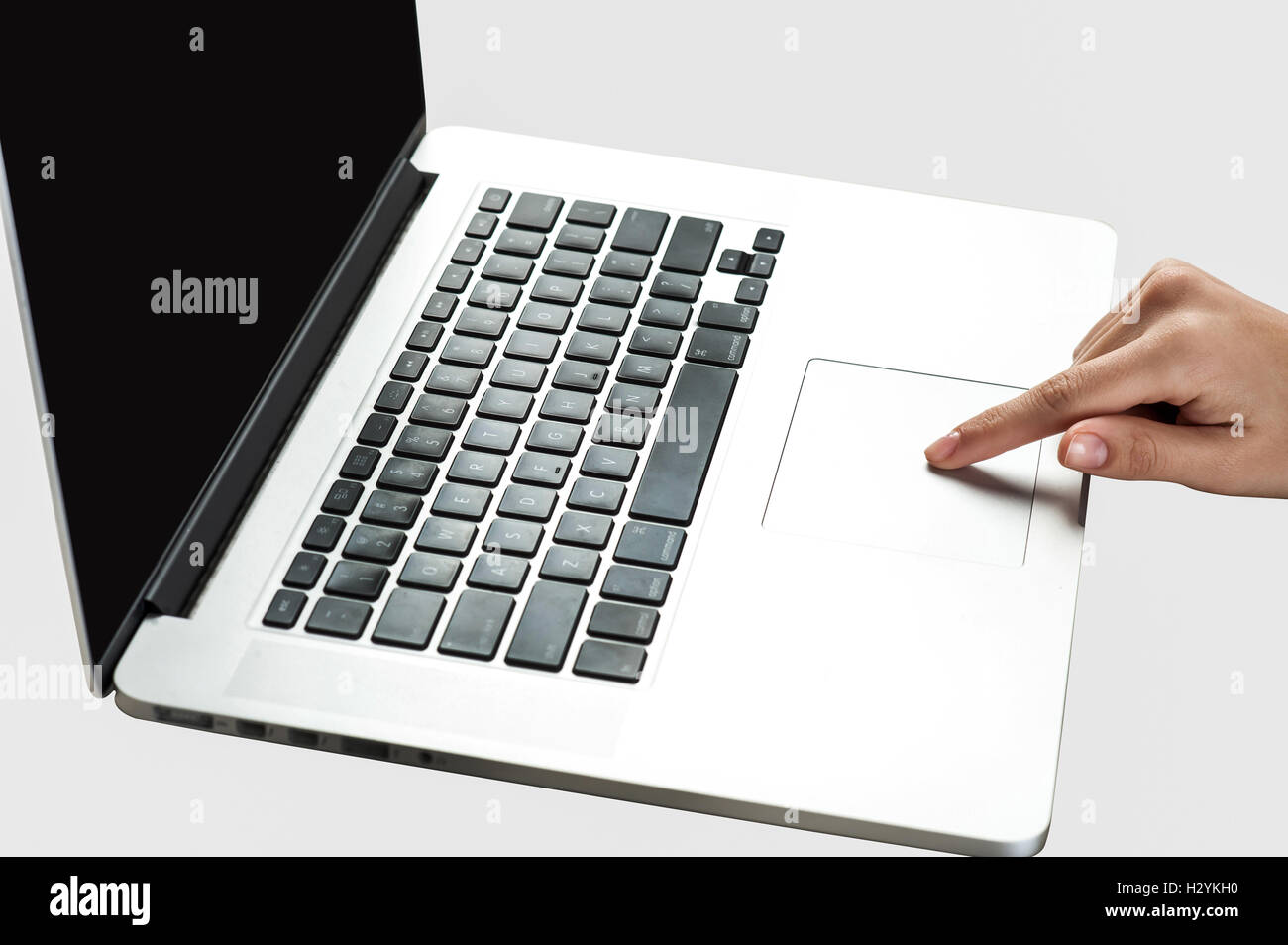 Woman hand using laptop Stock Photo - Alamy
