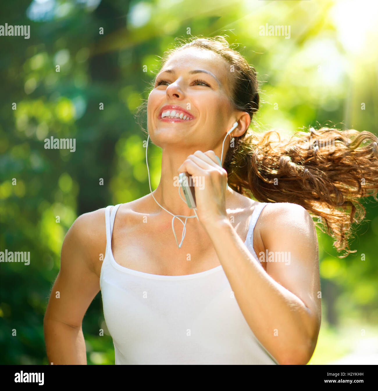 Running woman. Outdoor Workout in a Park Stock Photo - Alamy