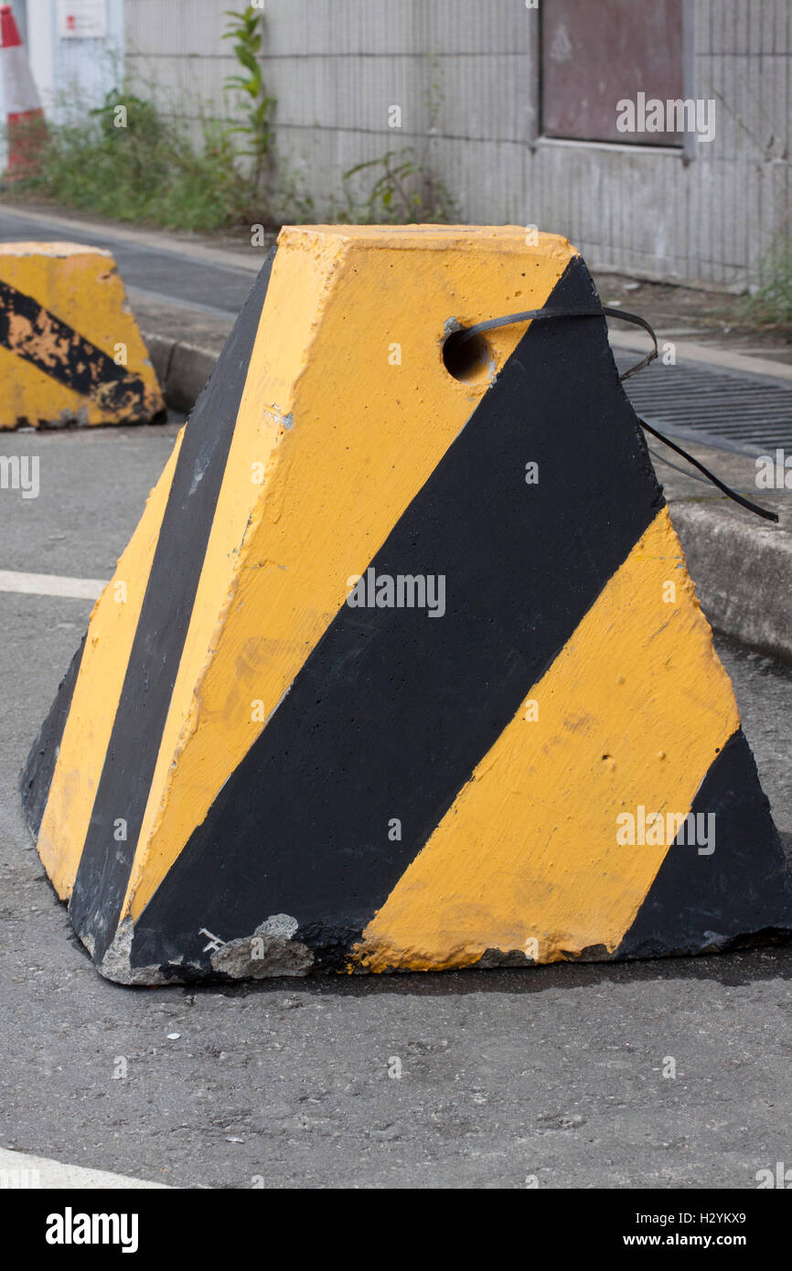 Roadside warning sign / warning stump Stock Photo - Alamy