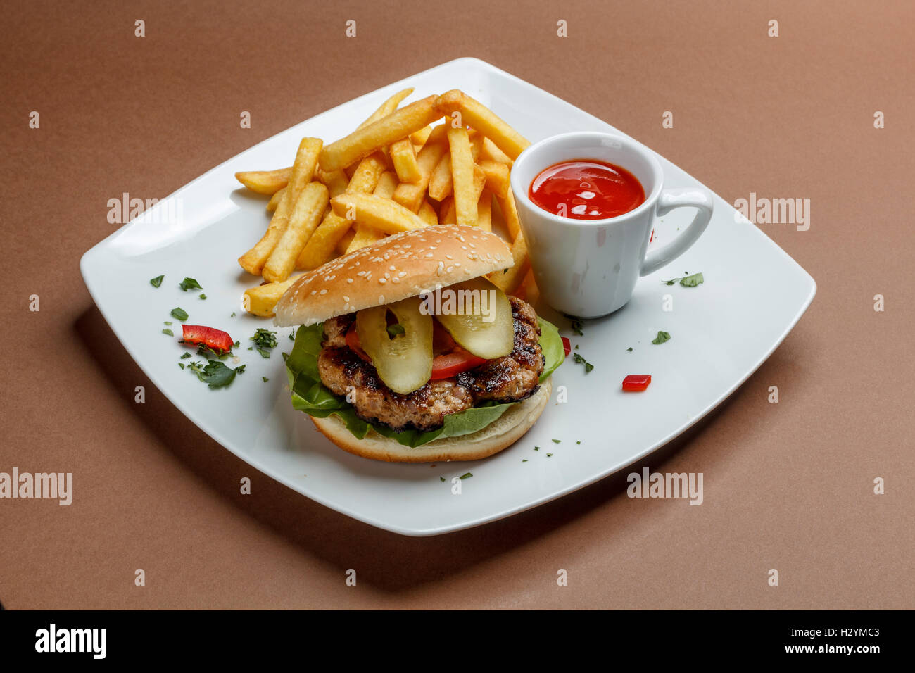 Burger and fries Stock Photo - Alamy