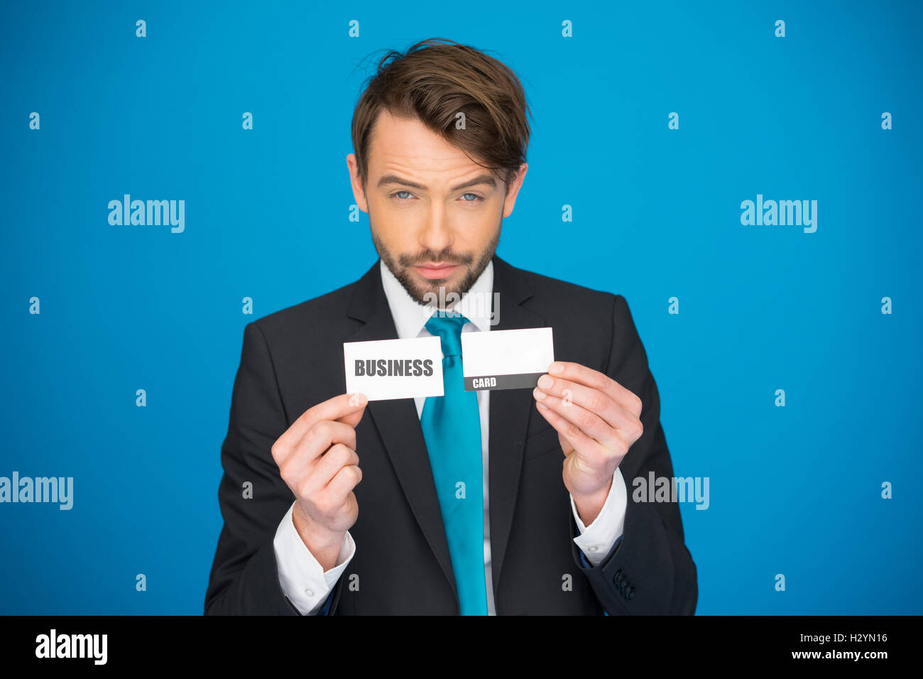 handsome businessman showing blank business card Stock Photo - Alamy