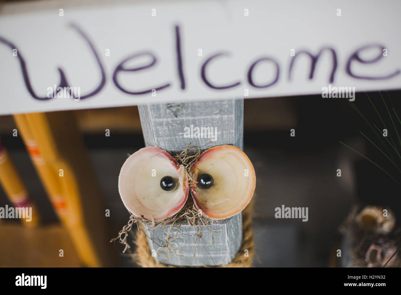 cute welcome sign with shell eyes Stock Photo - Alamy