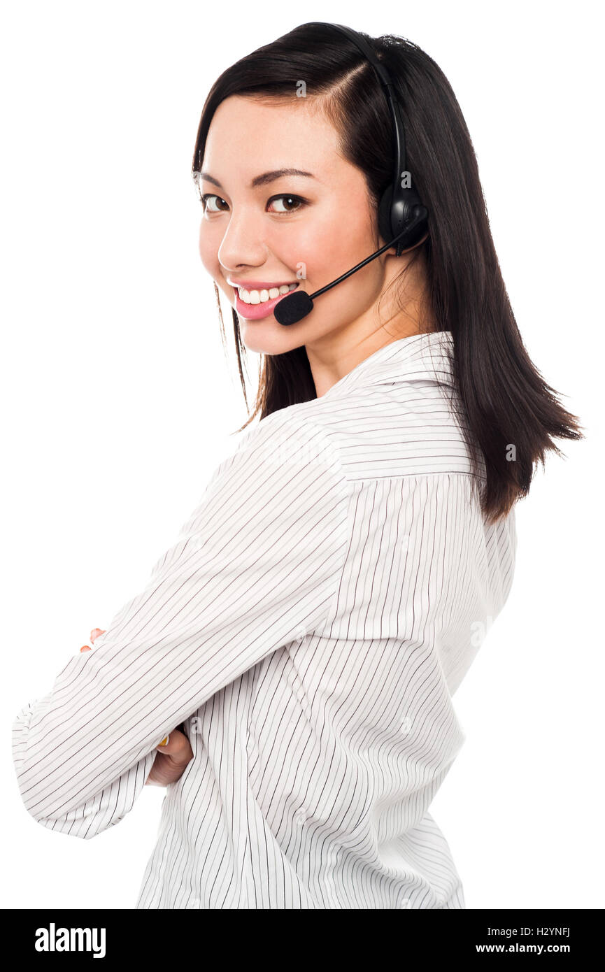 Smiling young call center executive Stock Photo - Alamy