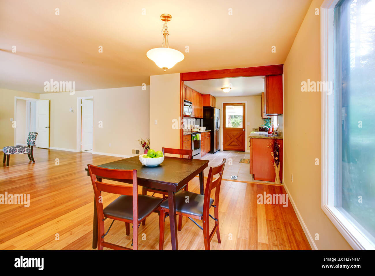 Empty room with dining table set Stock Photo - Alamy