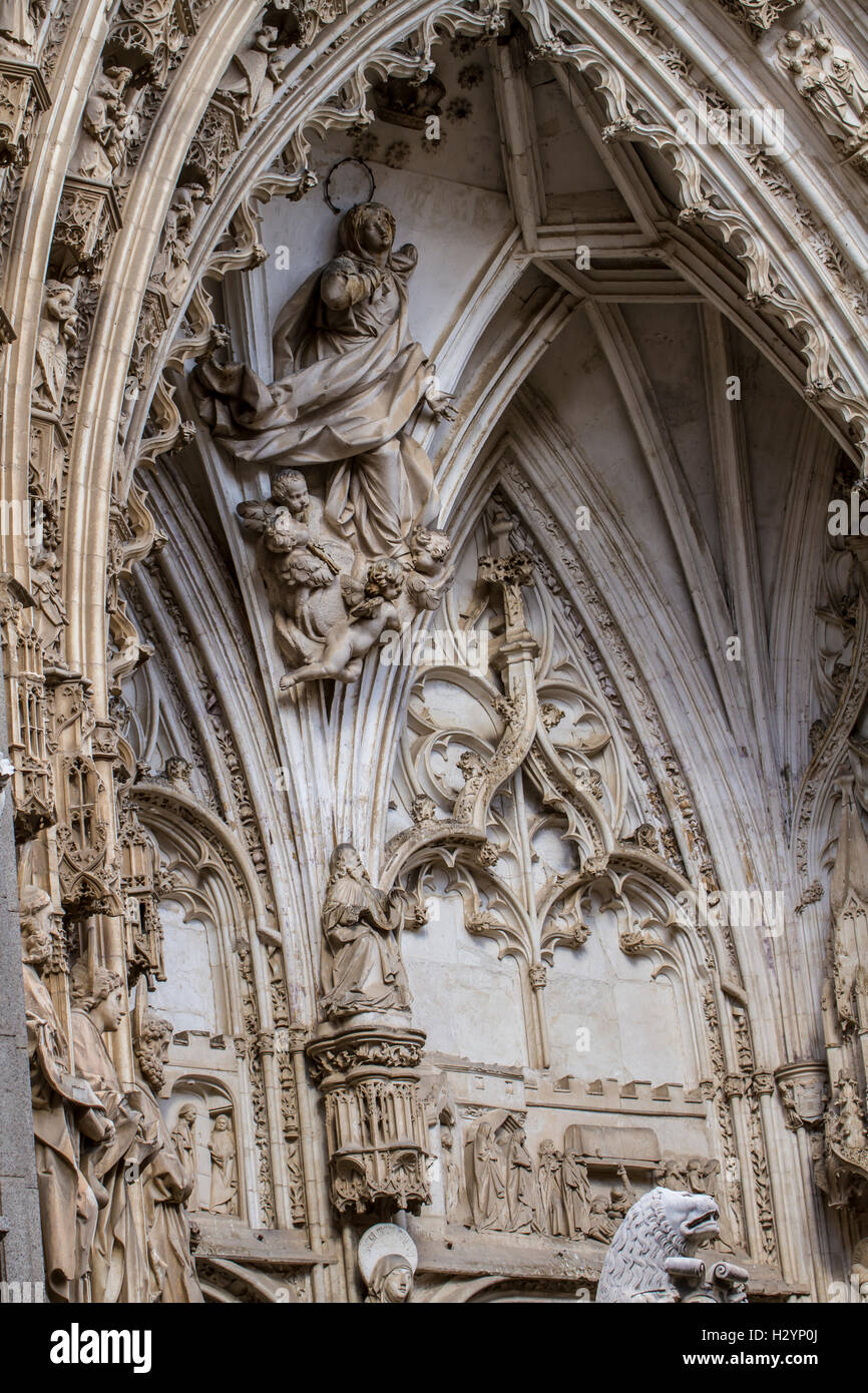 arch with figures of Gothic style cathedral in Toledo Spain Stock Photo ...
