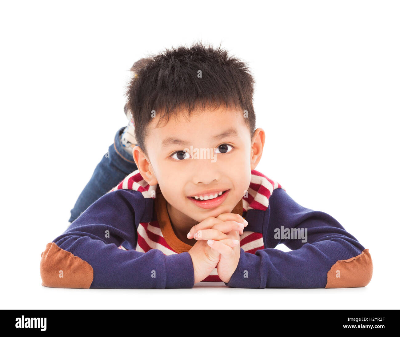 smiling boy is lying on the floor Stock Photo - Alamy