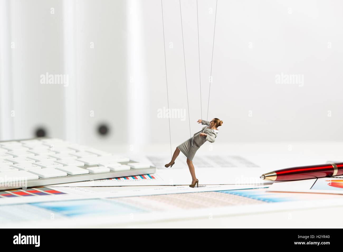 businesswoman puppet doll is on the desk Stock Photo - Alamy